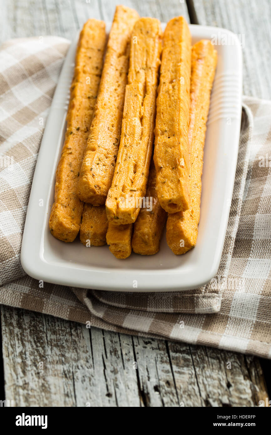 Crispy bread sticks on plate Stock Photo - Alamy