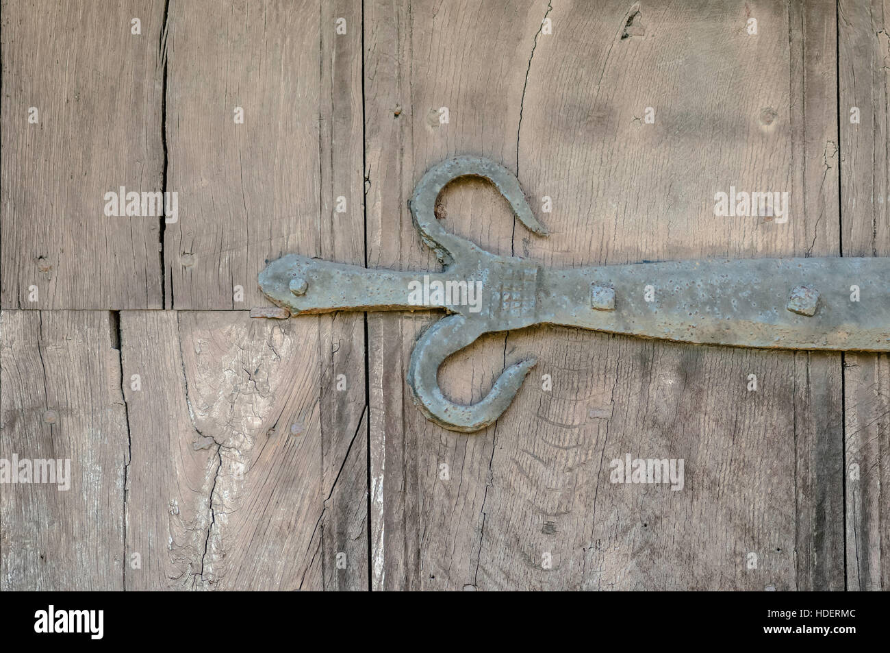 Old ancient wrought iron door medieval hinge hand forged Stock Photo ...