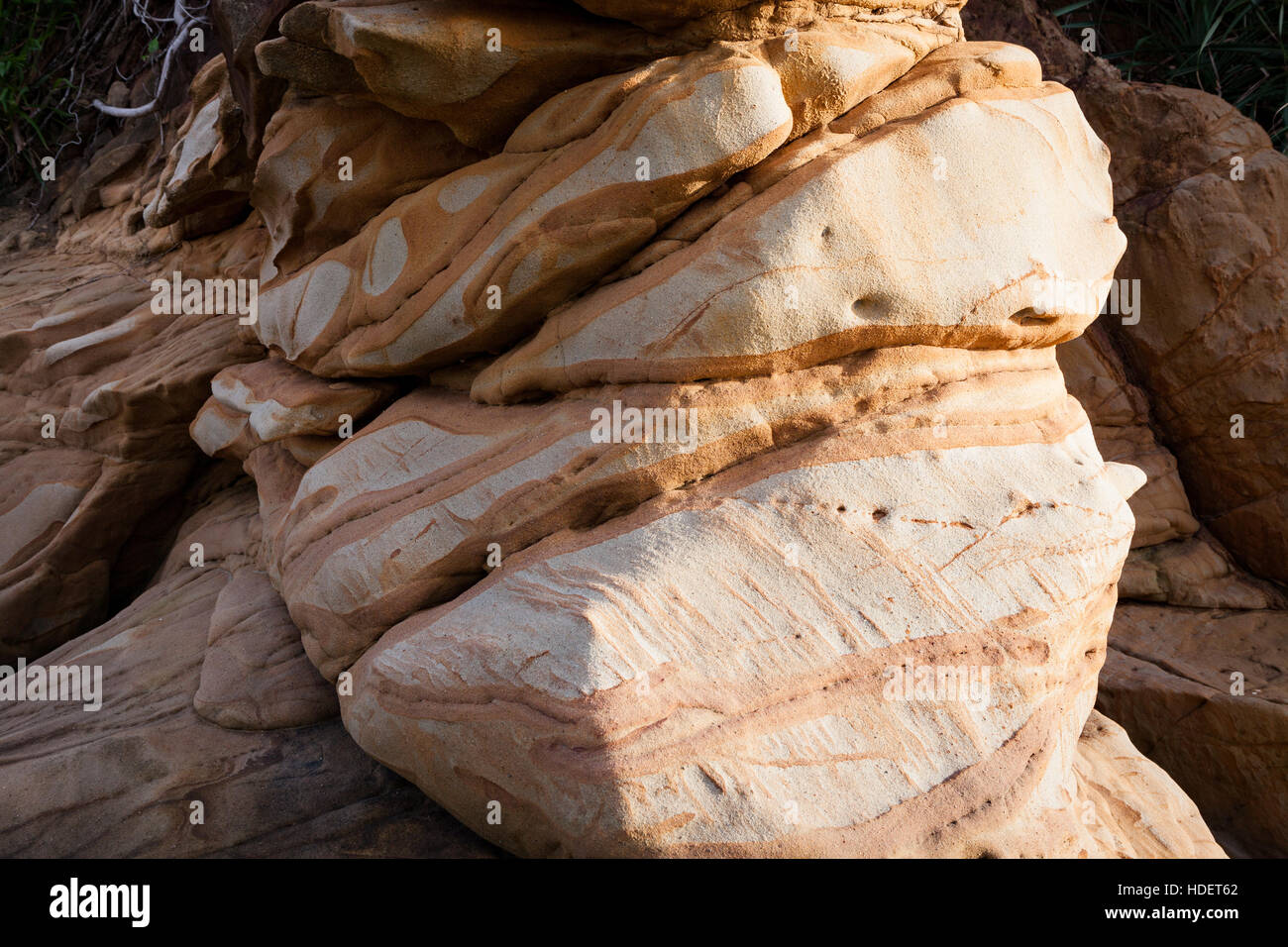 Sandstone rock at beach Stock Photo - Alamy