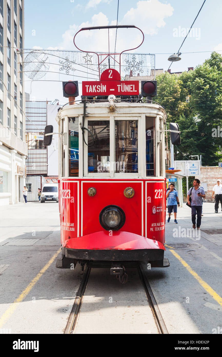 Istanbul, Turkey - July 1, 2016: Old red tram goes on Istiklal street ...