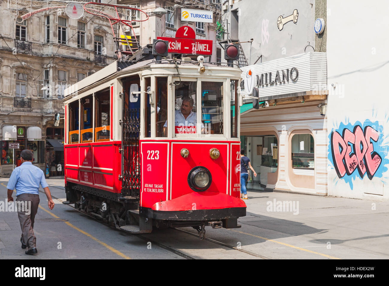 Istanbul, Turkey - July 1, 2016: Old red tram goes on Istiklal street ...