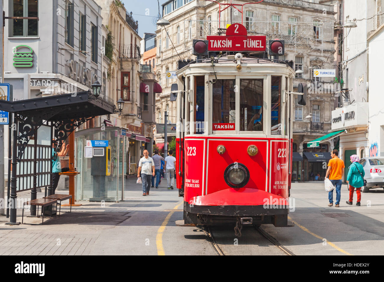 Istanbul, Turkey - July 1, 2016: Old red tram goes on Istiklal street ...