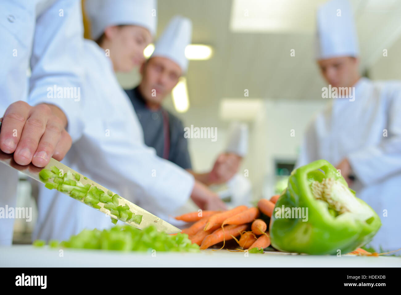 Peppers being wiped off blade of knife Stock Photo - Alamy