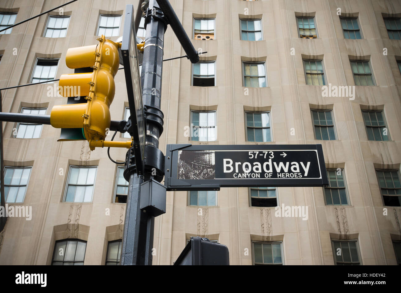 broadway street sign with yellow traffic lights in new york city Stock ...