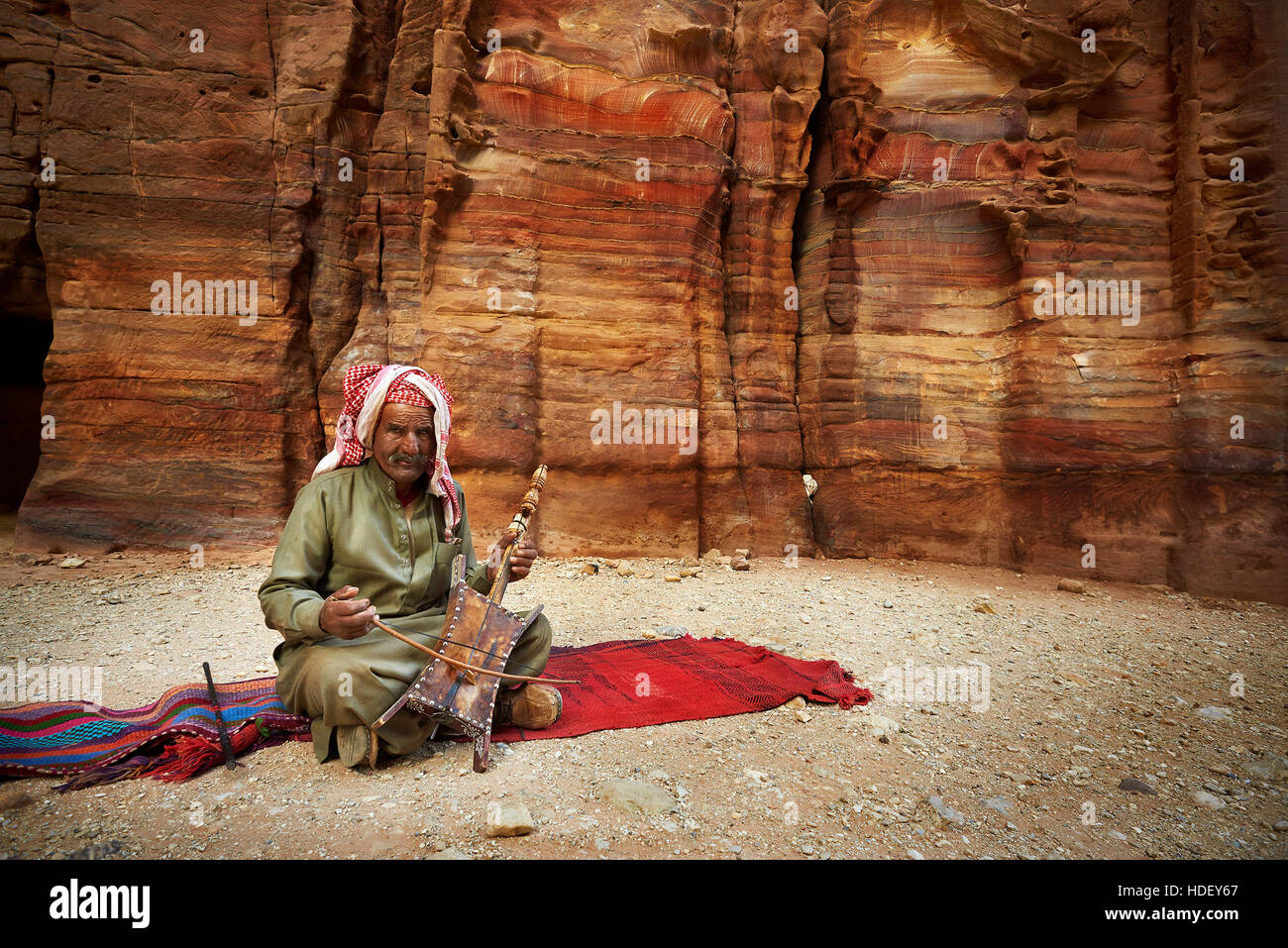 2016-04-27 An old man playing traditional Bedouin Rababa string musical ...