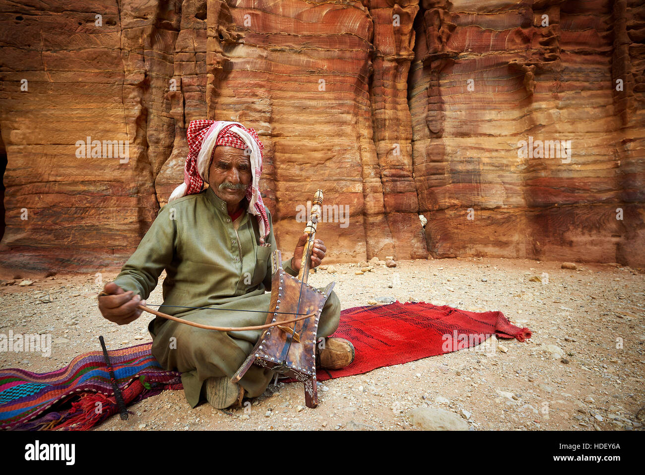2016-04-27 An old man playing traditional Bedouin Rababa string musical ...