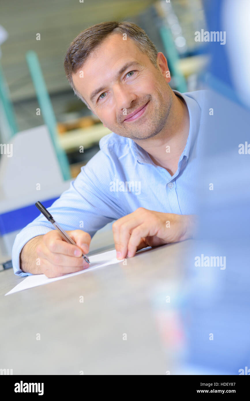 Male secretary writing hi-res stock photography and images - Alamy
