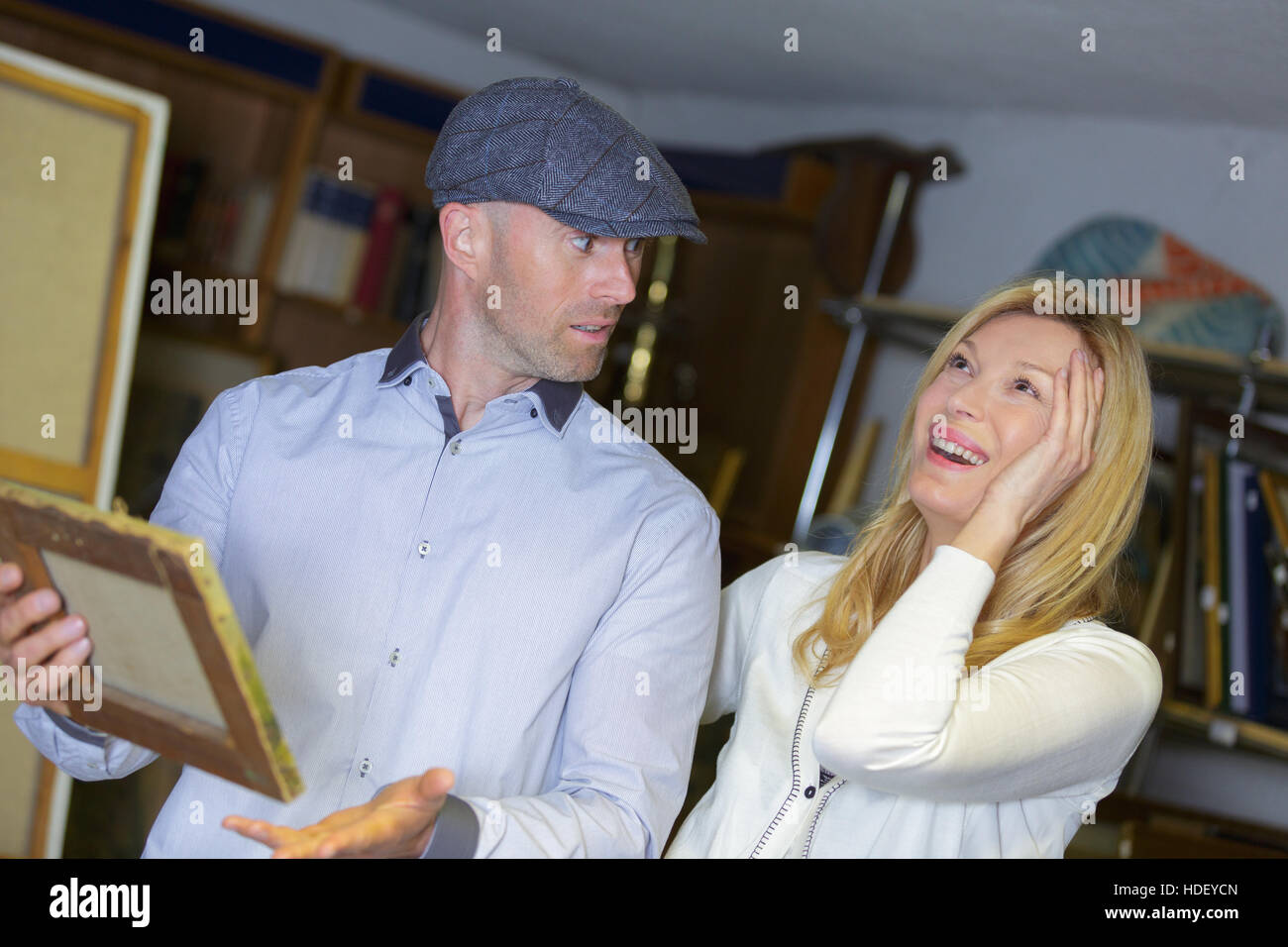 People buying stuff hi-res stock photography and images - Alamy