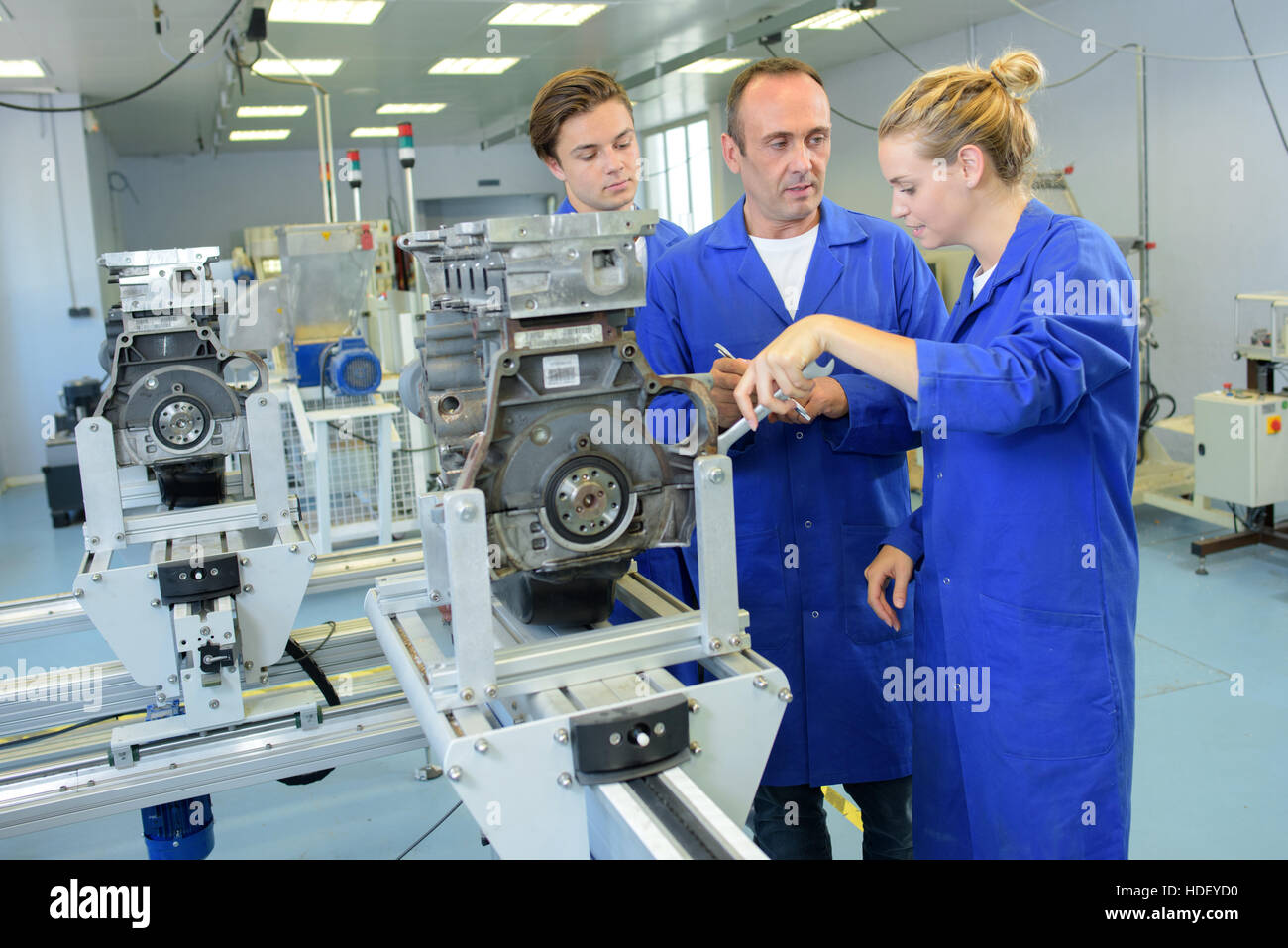 Female operative using machinery Stock Photo - Alamy