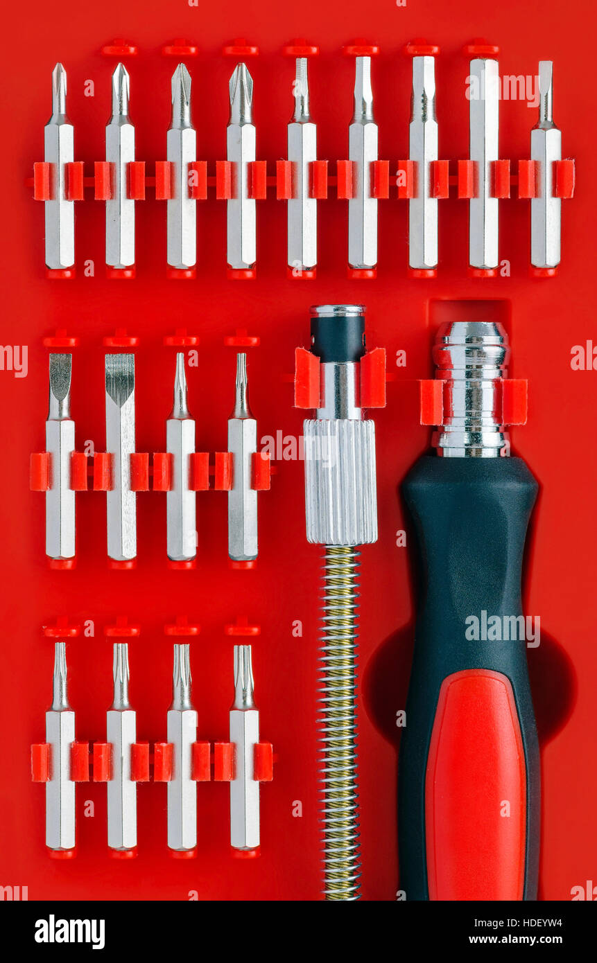 Screwdriver Kit on Red Background Stock Photo - Alamy