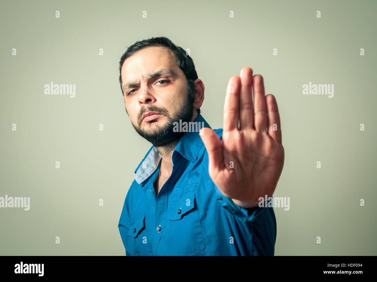 man with beard making stop sign Stock Photo - Alamy