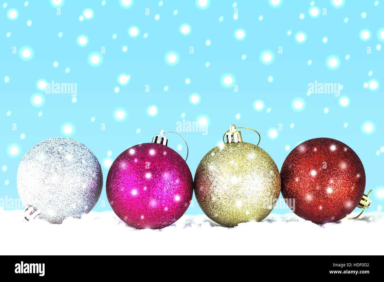 Ball on snow with a blue background Stock Photo - Alamy