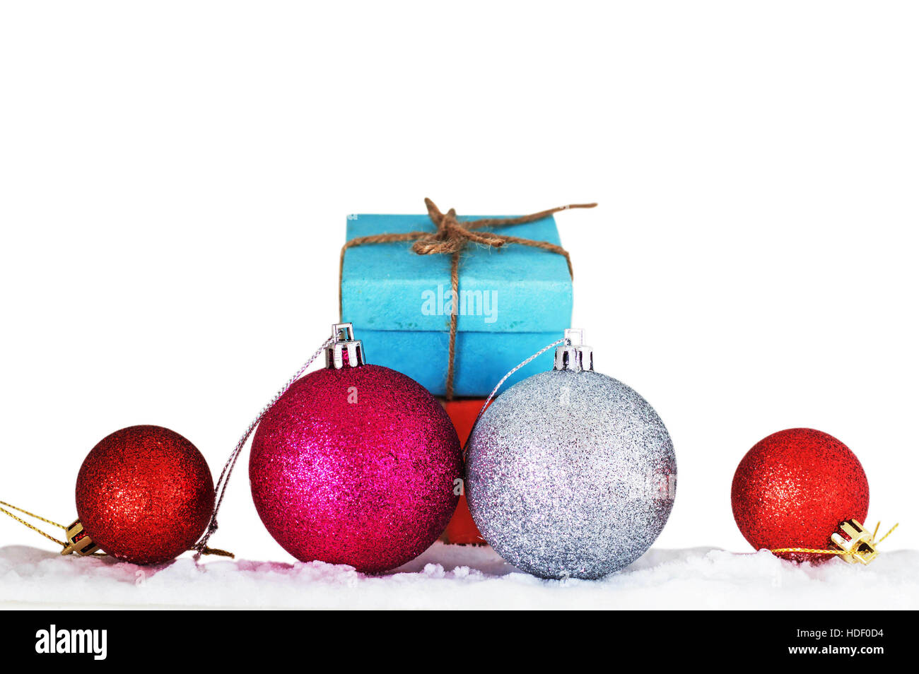 Balls with a gift on a white background Stock Photo - Alamy