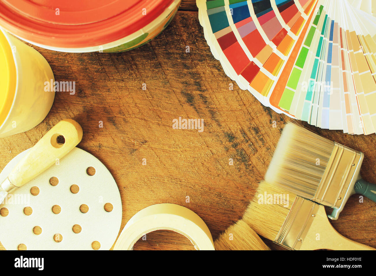 various painting tools and color guide on wooden background Stock Photo ...