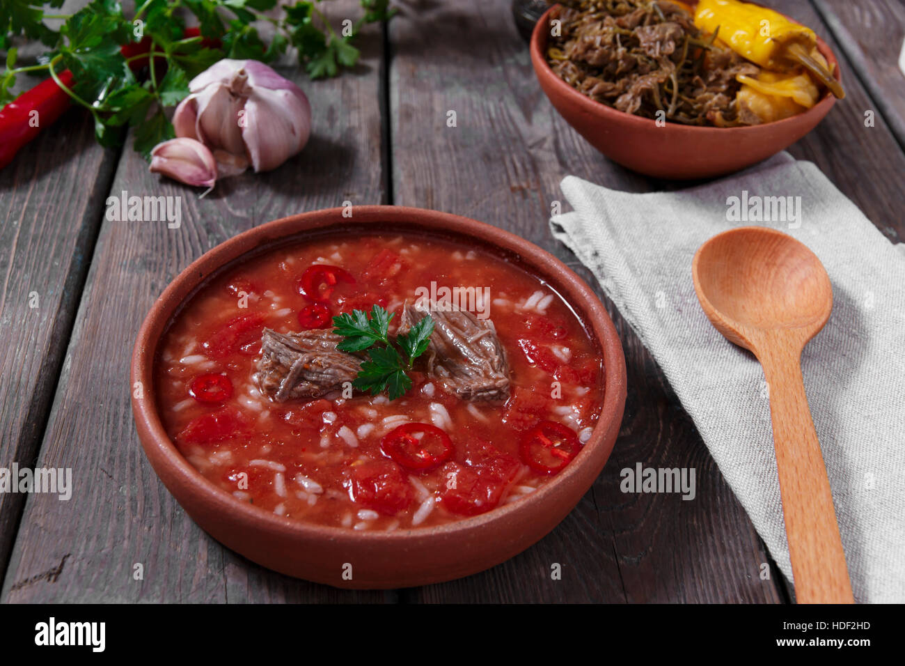 Traditional Georgian soup Kharcho with meat and rice in ceramic ware ...