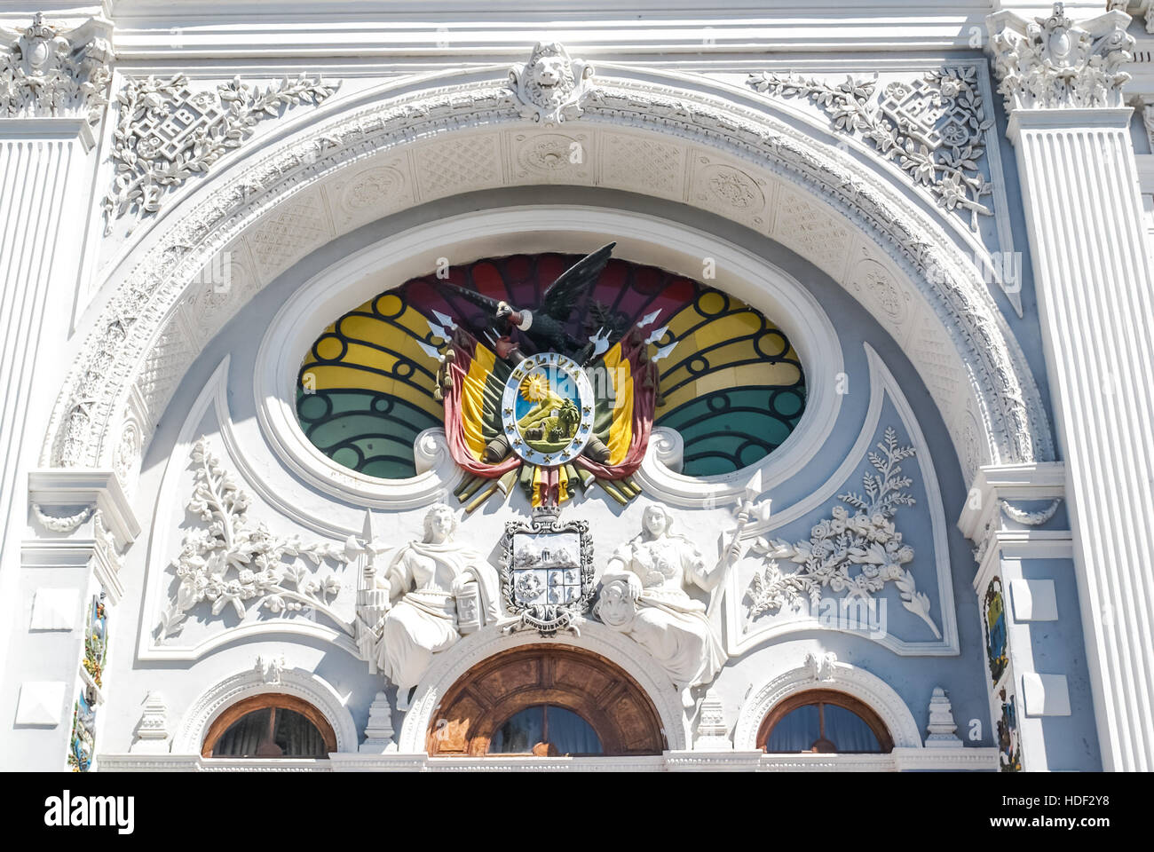 Photo of unique white architecture with colourful flag and glass in ...