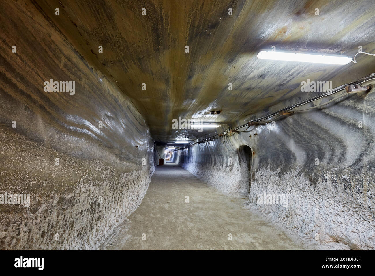 Wide angle of an underground tunnel into a salt mine Stock Photo - Alamy
