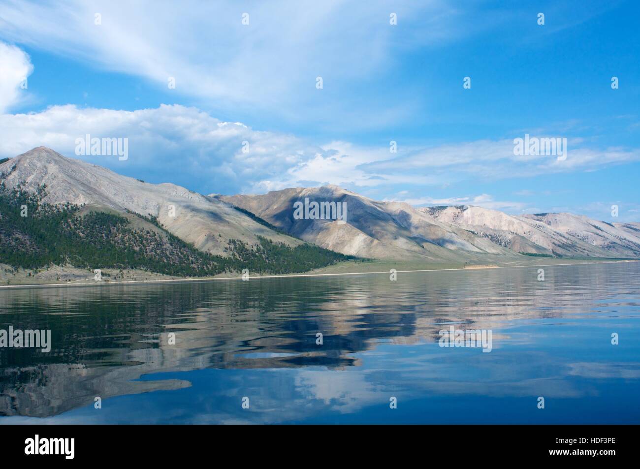 Mountains on the lake Baikal a clear day, blue sky Stock Photo - Alamy