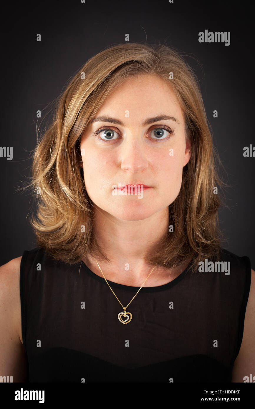 Beautiful woman doing different expressions in different sets of ...