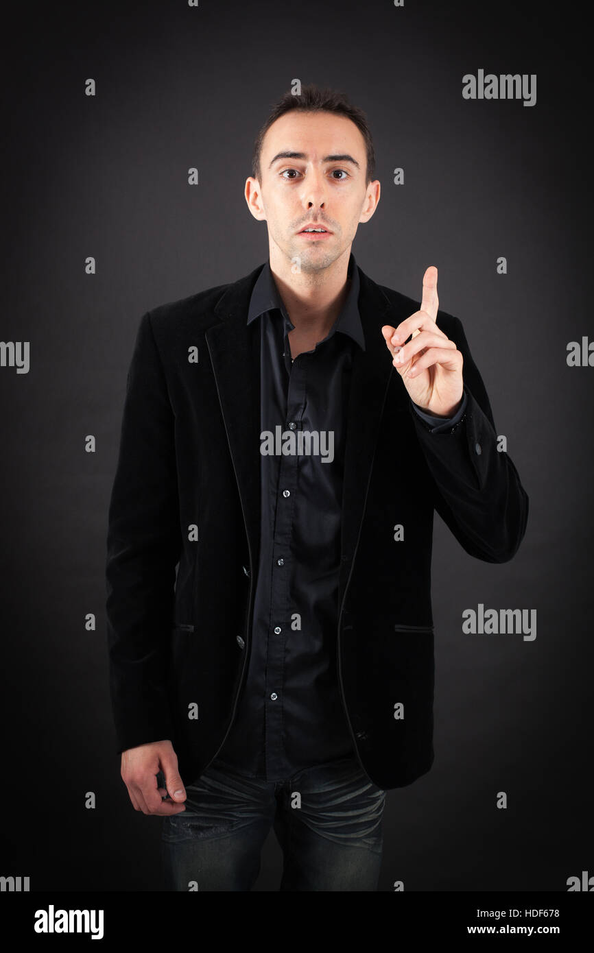 Handsome man doing different expressions in different sets of clothes ...