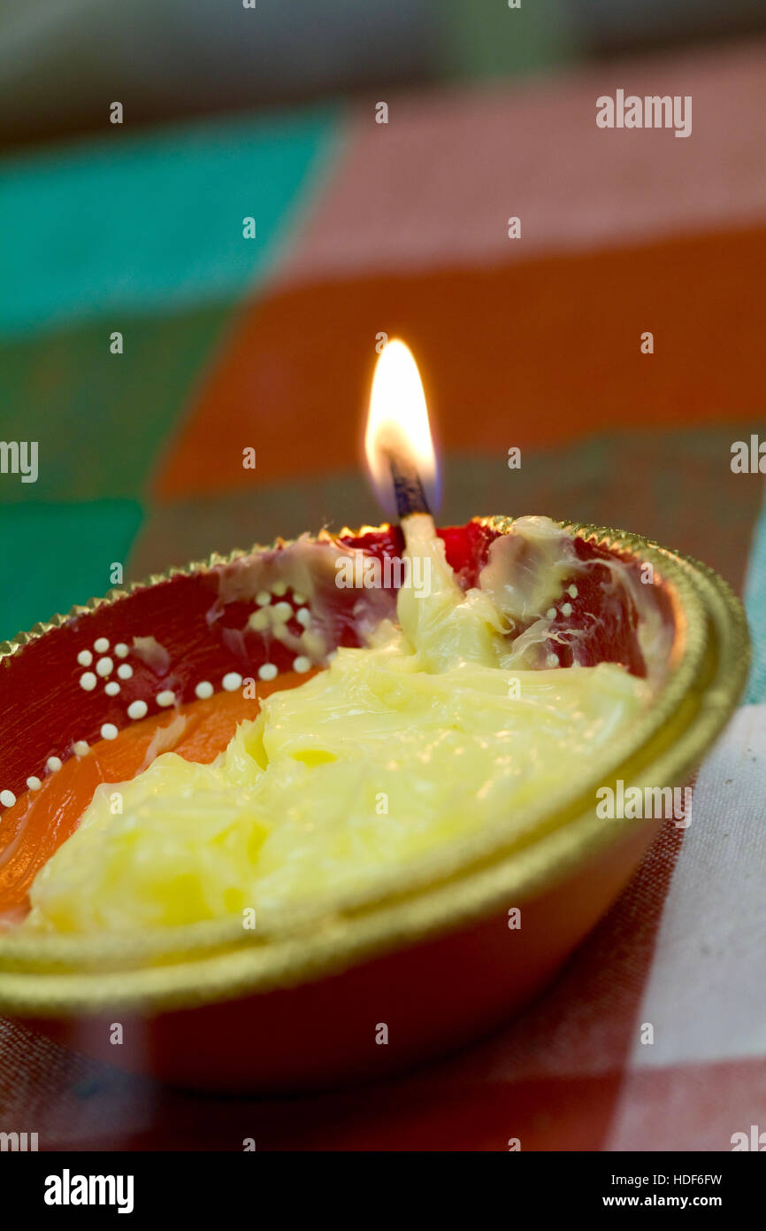 An oil lamp (diya) during Diwali celebrations in India. Diwali is one ...