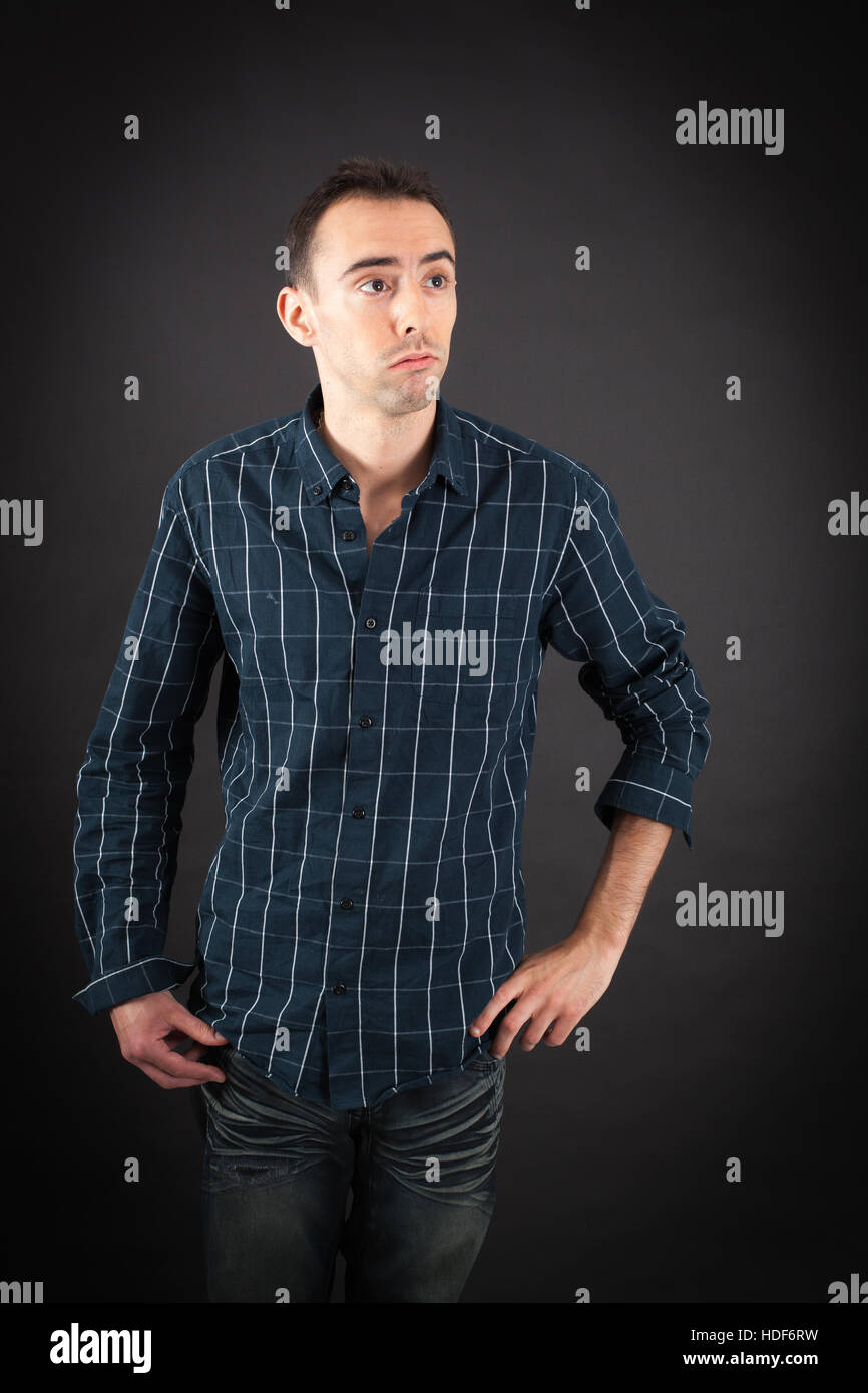 Handsome man doing different expressions in different sets of clothes ...