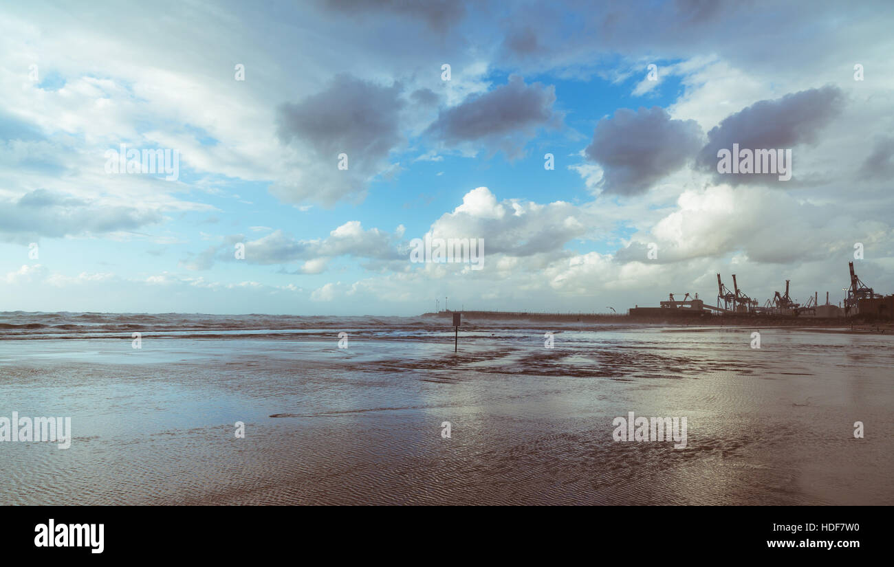 environmental pollution factory on the sea shore Stock Photo - Alamy