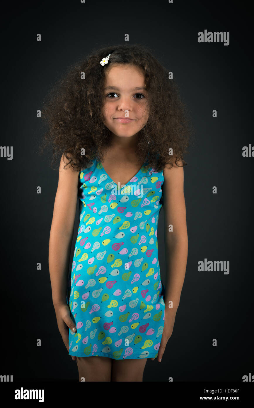 Beautiful girl doing different expressions in different sets of clothes ...