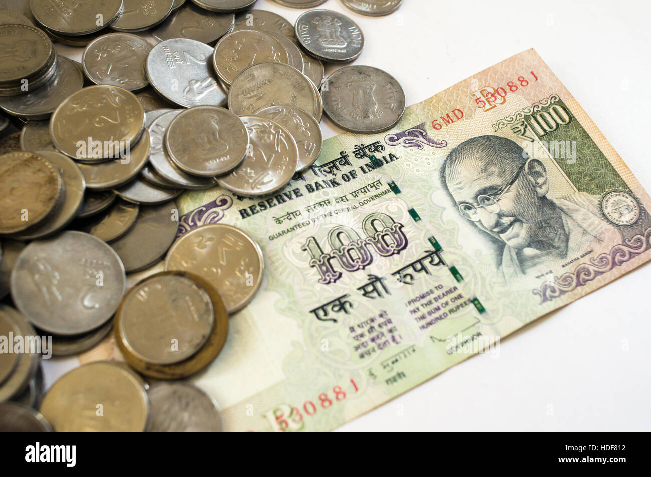 Indian paper currency and coins isolated on white. Demonetization has ...