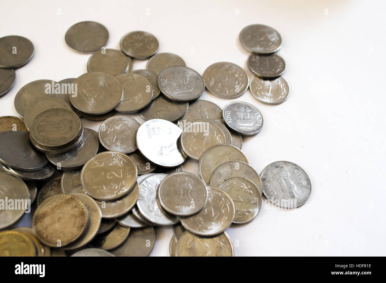 Pile of Indian coins isolated on white. Coins have seen a huge surge in ...