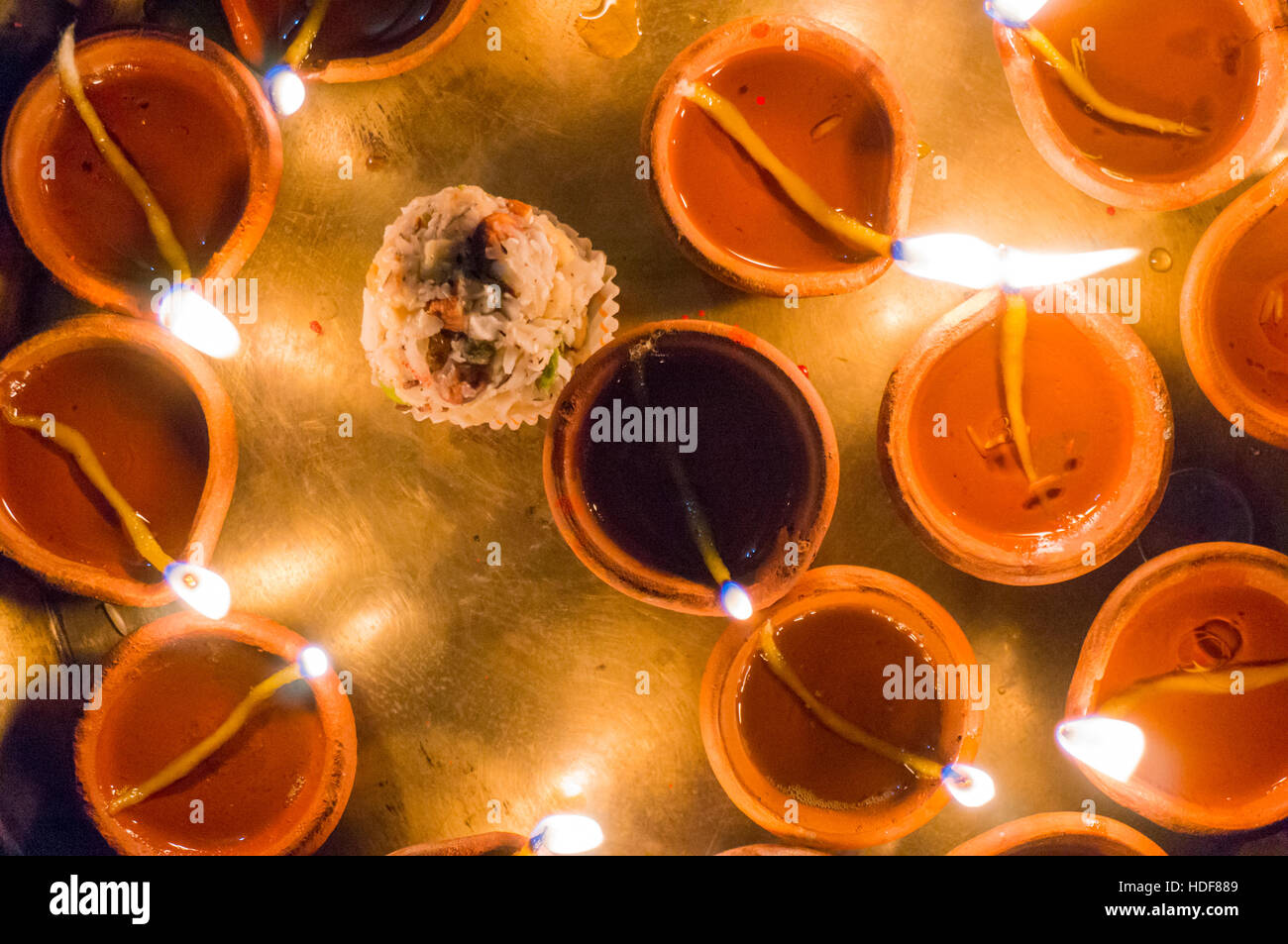 Earthenware pots with cotton wicks and oil, diya, used for lighting ...