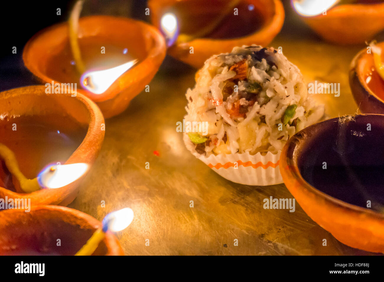 Earthenware pots with cotton wicks and oil, diya, used for lighting ...