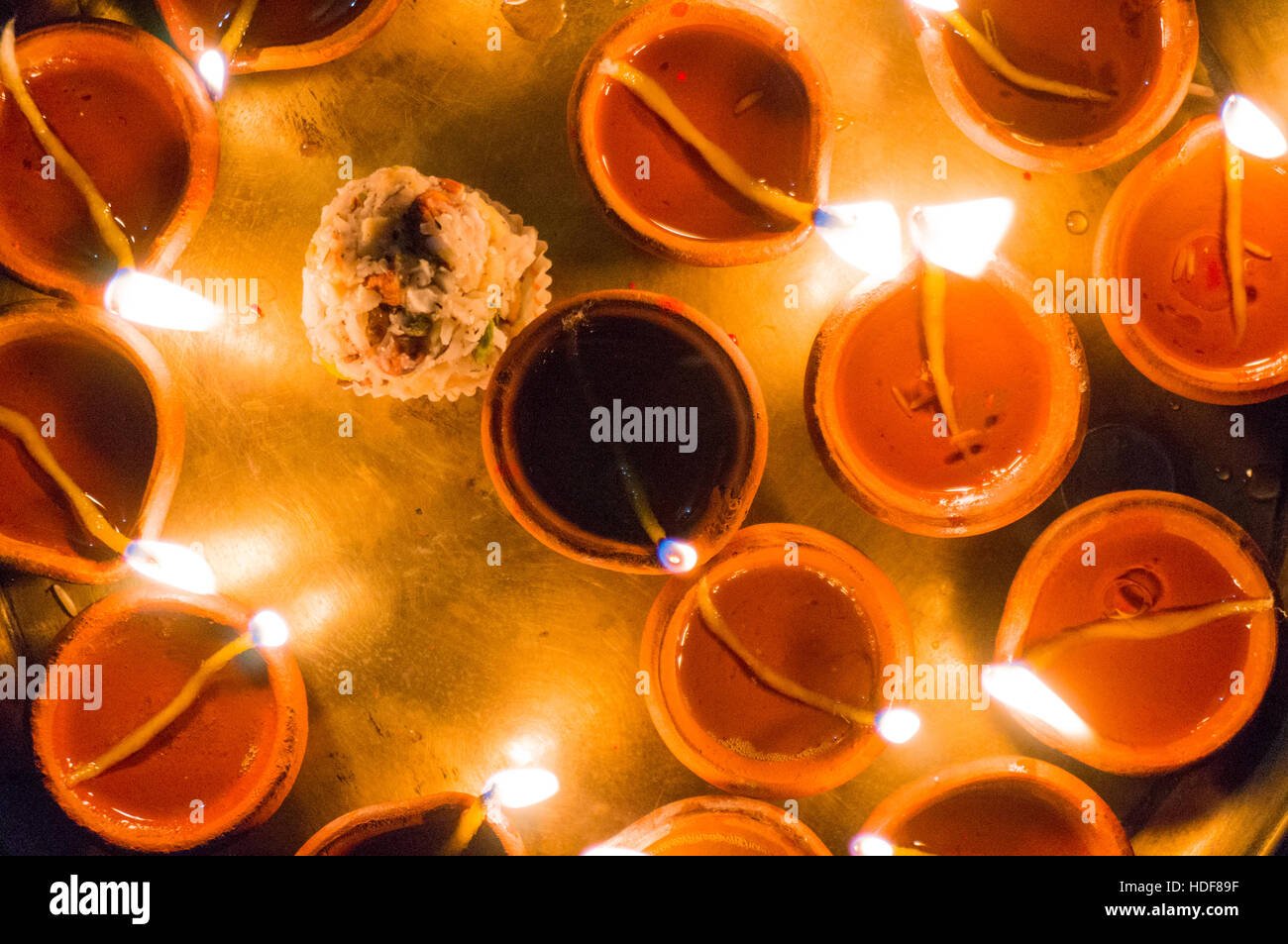 Earthenware pots with cotton wicks and oil, diya, used for lighting ...