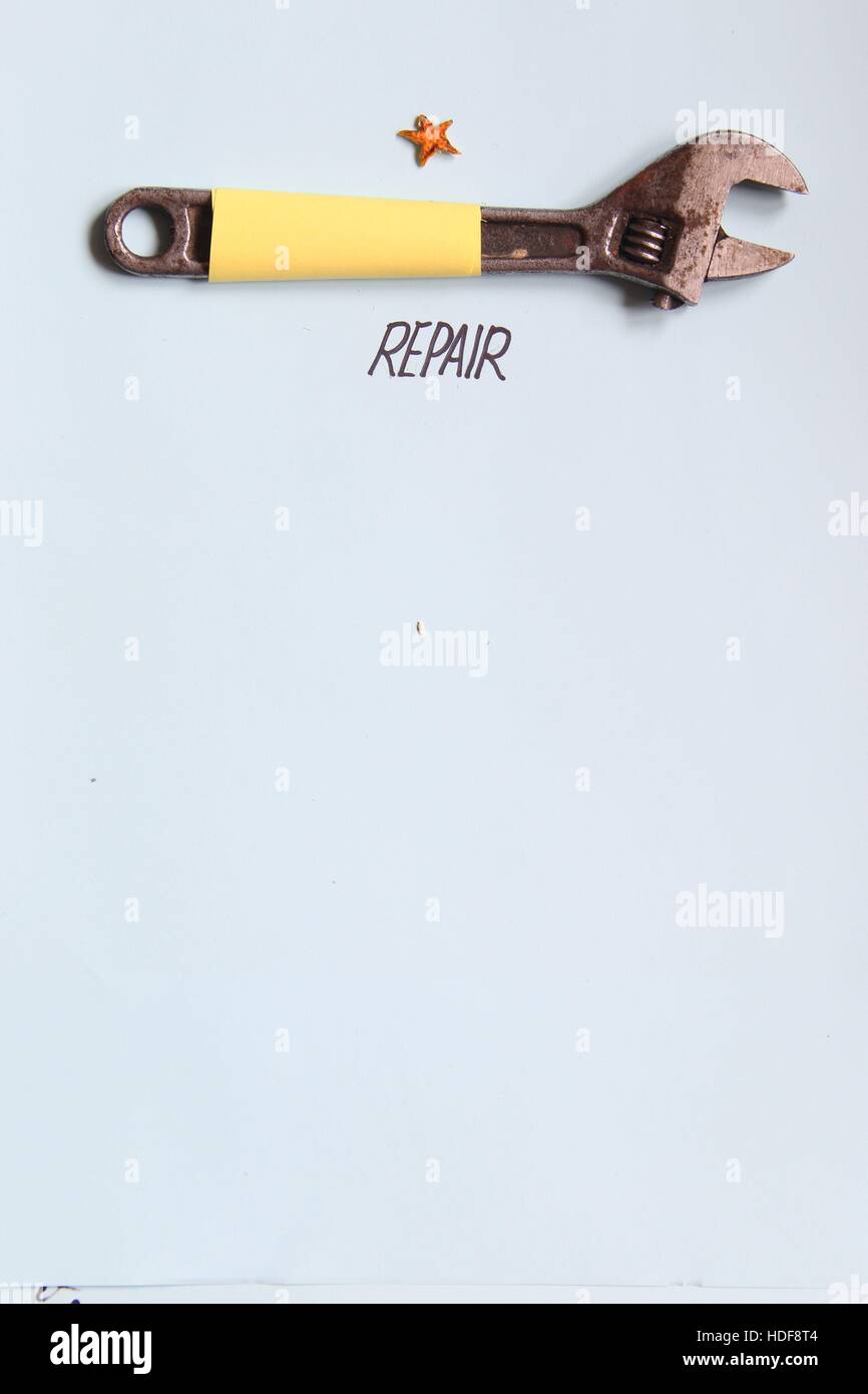Repair service background, wrench and text Stock Photo - Alamy