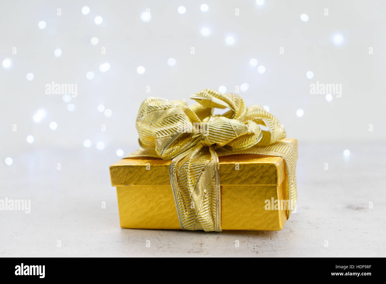 Christmas golden present box Stock Photo - Alamy