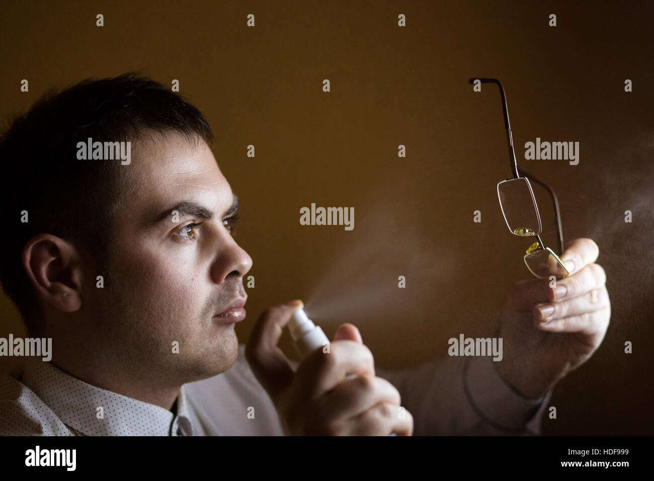 Cleaning spectacles hi-res stock photography and images - Alamy