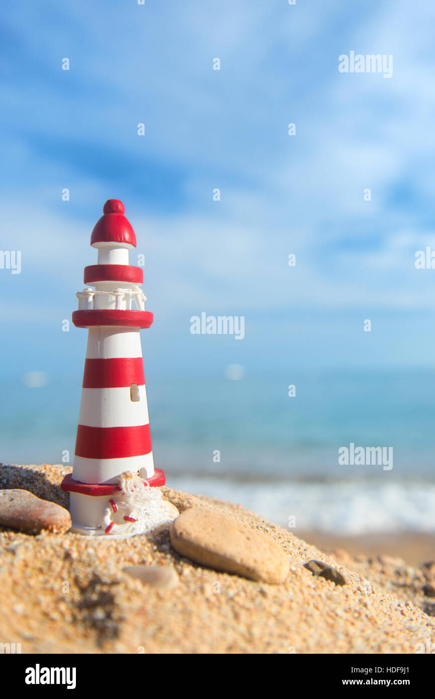 Miniature lighthouse at the beach Stock Photo - Alamy