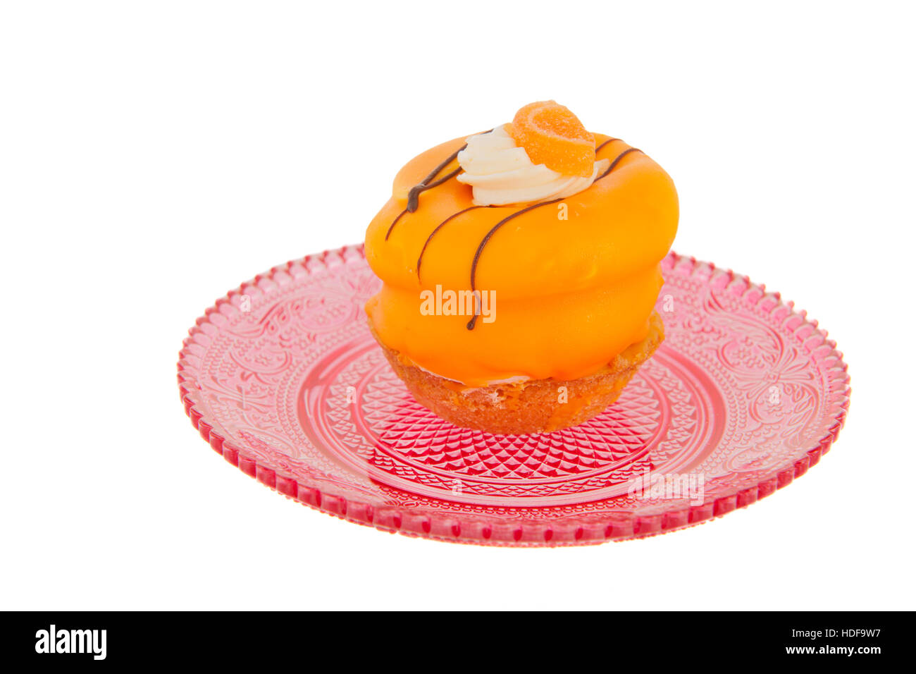 Yellow pastry on pink glass plate Stock Photo - Alamy