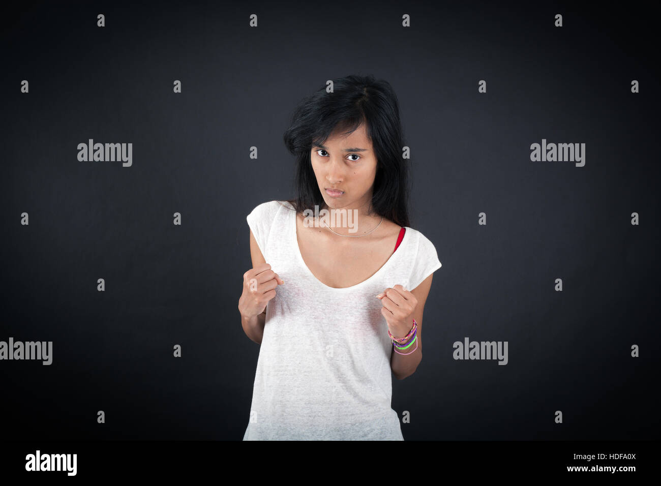 Beautiful woman doing different expressions in different sets of ...