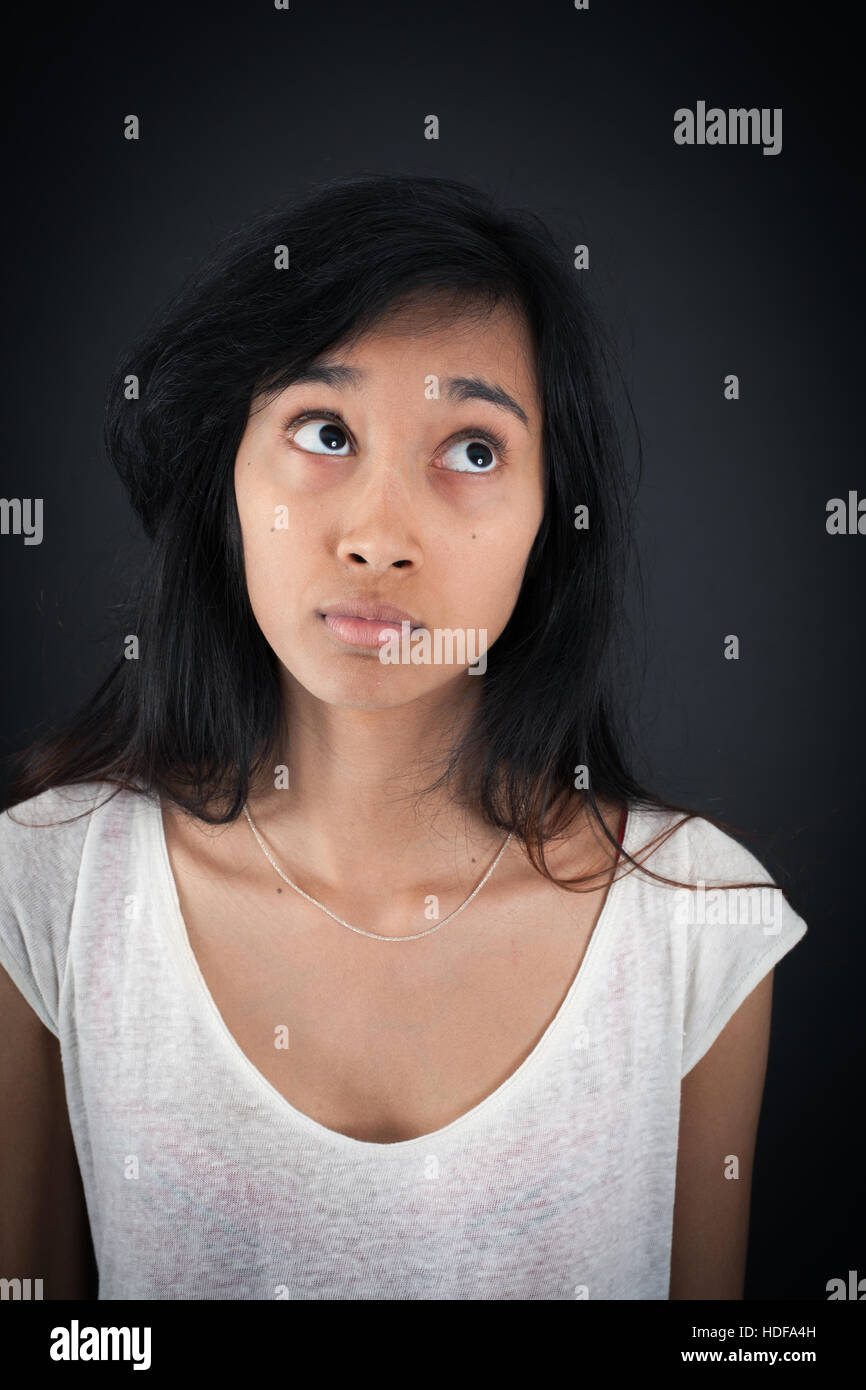 Beautiful woman doing different expressions in different sets of ...