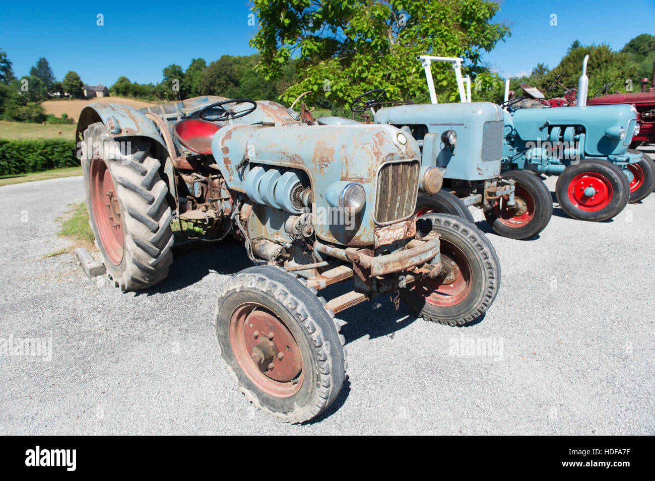 Vintage tractors in a row Stock Photo - Alamy