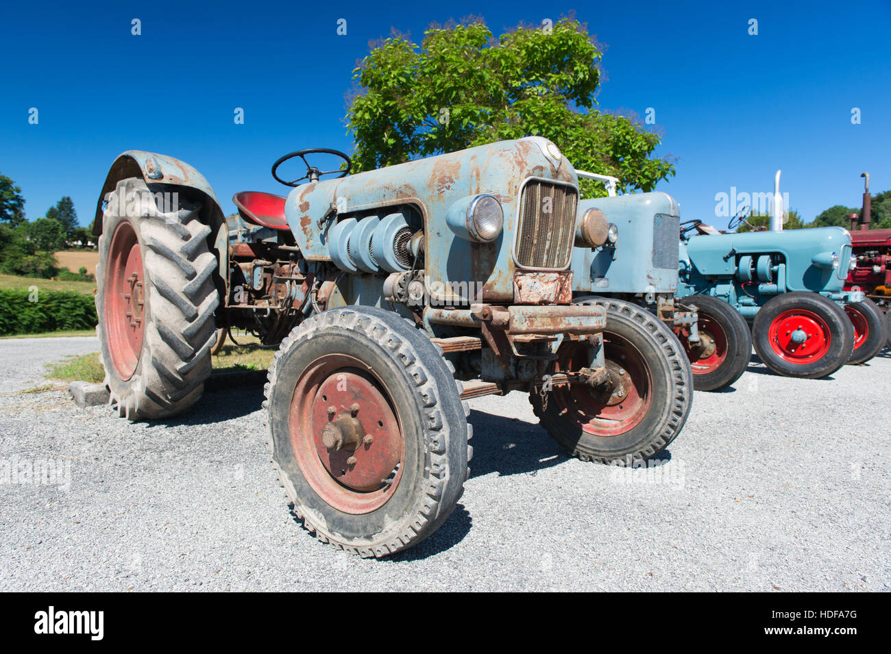 Vintage tractors in a row Stock Photo - Alamy