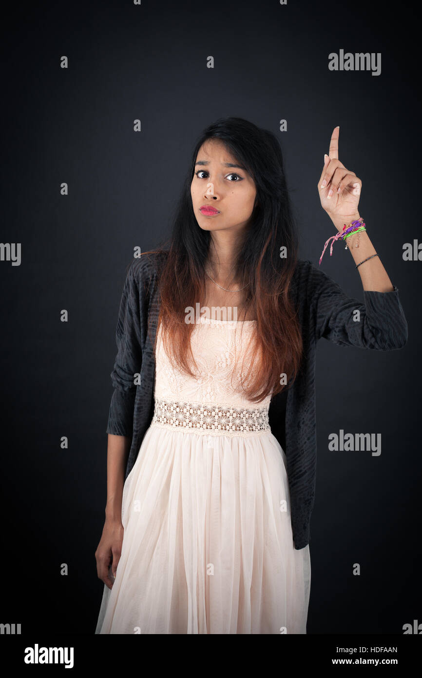 Beautiful woman doing different expressions in different sets of ...