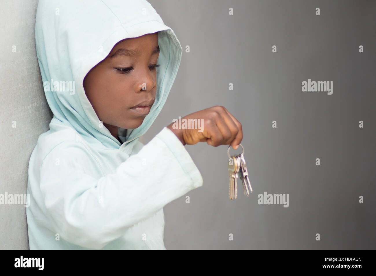 child shows the keys of the house of his parents Stock Photo - Alamy