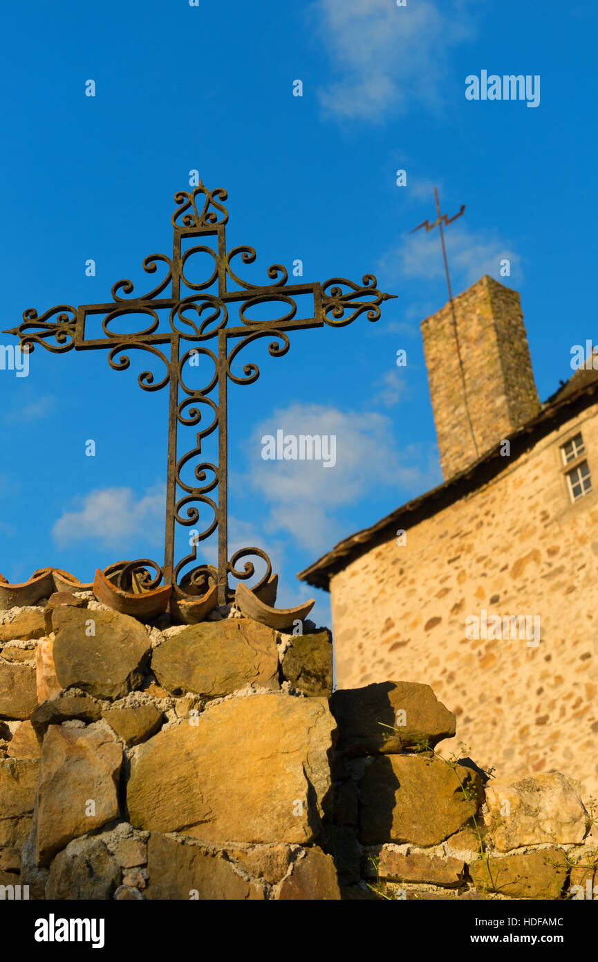 Metal cross from ironwork at castle Stock Photo - Alamy
