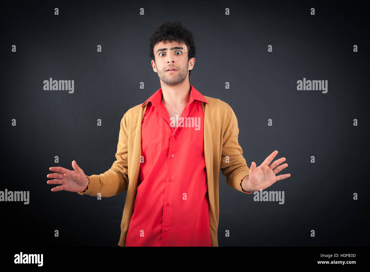 Handsome man doing different expressions in different sets of clothes ...