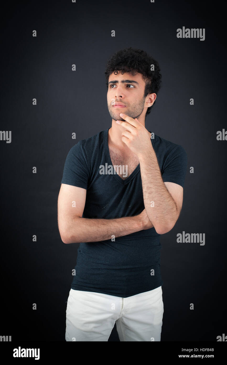 Handsome man doing different expressions in different sets of clothes ...