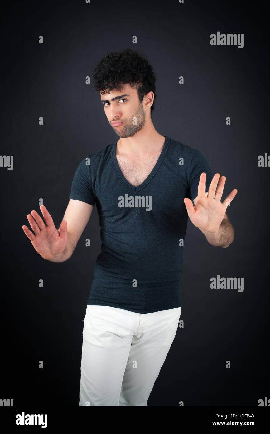 Handsome man doing different expressions in different sets of clothes ...