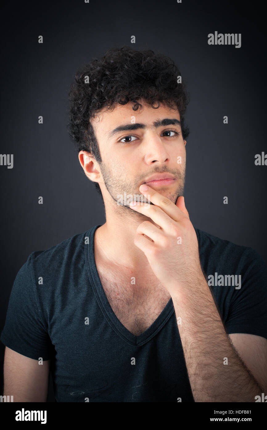 Handsome thinking male model hi-res stock photography and images - Alamy