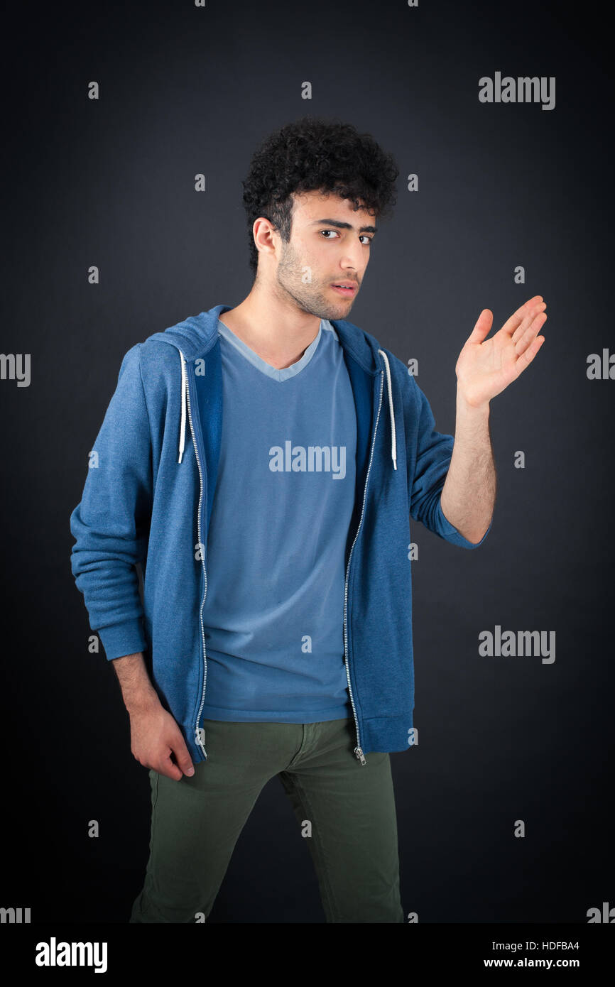 Handsome man doing different expressions in different sets of clothes ...